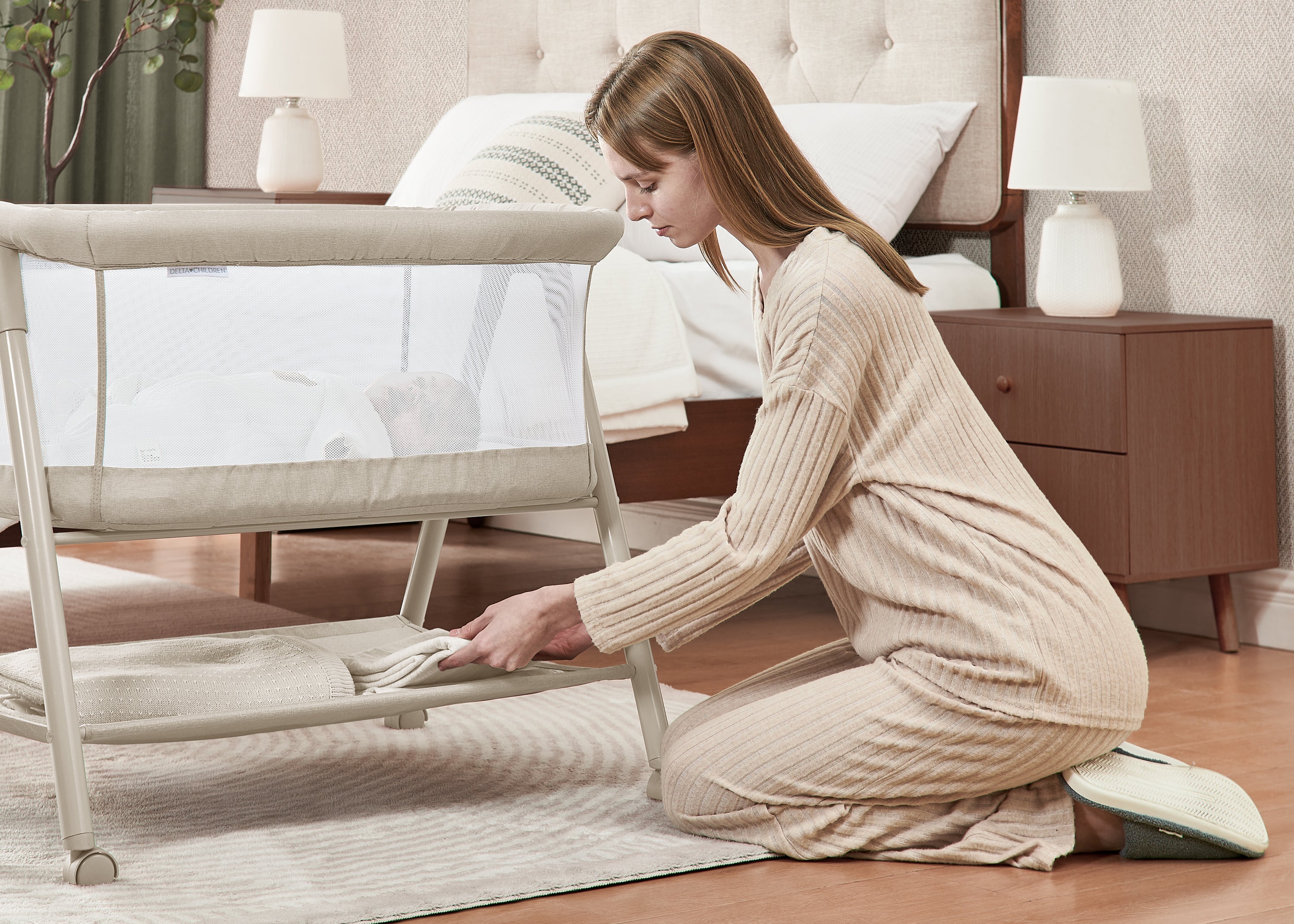 Haven AirFlow Bassinet with Breathable Mesh and Wheels | Delta Children
