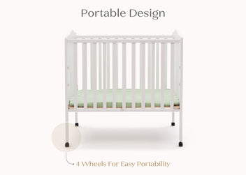 Folding Portable Mini Baby Crib with 1.5-inch Mattress | Delta Children