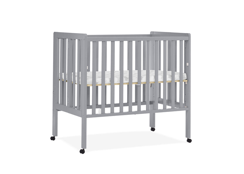 Lee Portable Folding Mini Crib with 1.5-Inch Mattress | Delta Children